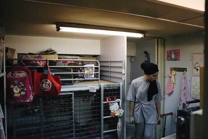 Kowloon Walking Tour on the Dark Side of Hong Kong - Portland Street: From Tradition to Skyscrapers