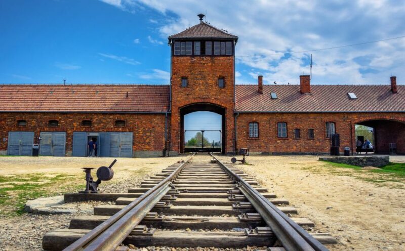 Krakow: Auschwitz Guided Tour with Optional Hotel Pickup - Key Points
