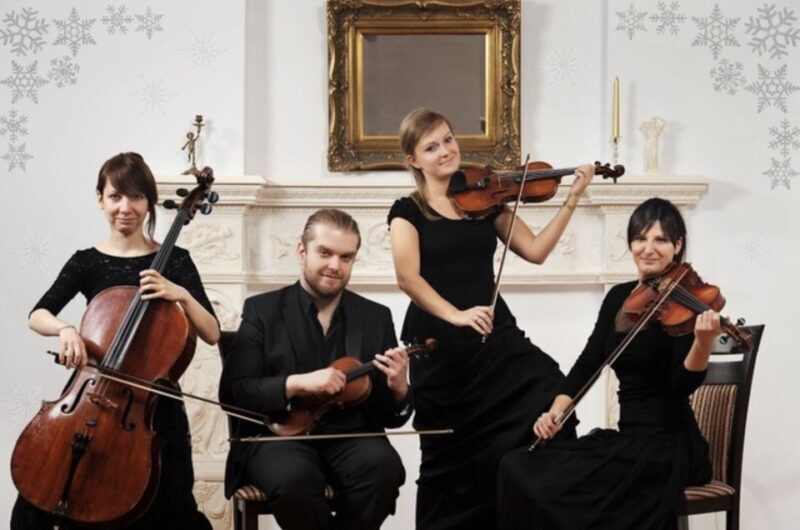 Krakow: Christmas Music Concert With Wine - Atmosphere and Audience Experience