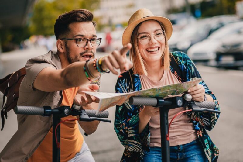 Krakow: Guided Sightseeing Tour by E-Scooter with Snacks - Key Points