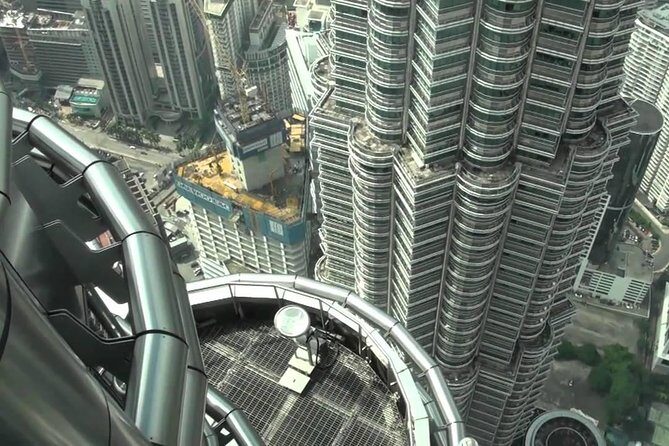 Kuala Lumpur Full Day City Tour Include Twin Tower Entrance - Shopping and Cultural Stops: A Glimpse into Malaysian Life