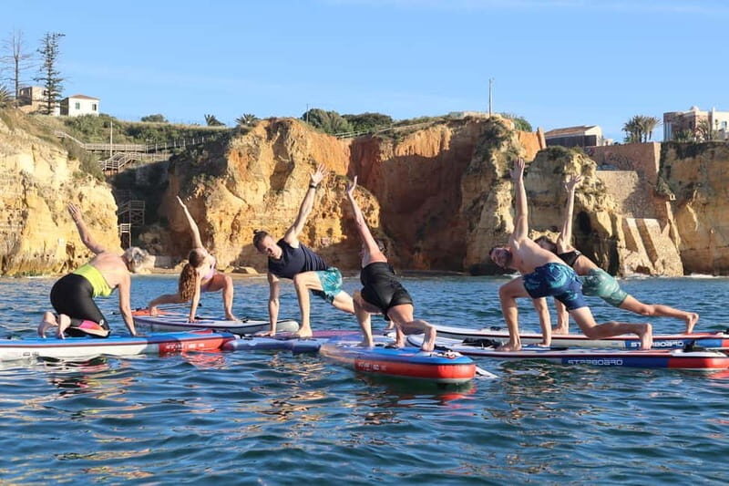 Lagos: Sunrise SUP Yoga Experience at Praia dos Estudantes - Key Points