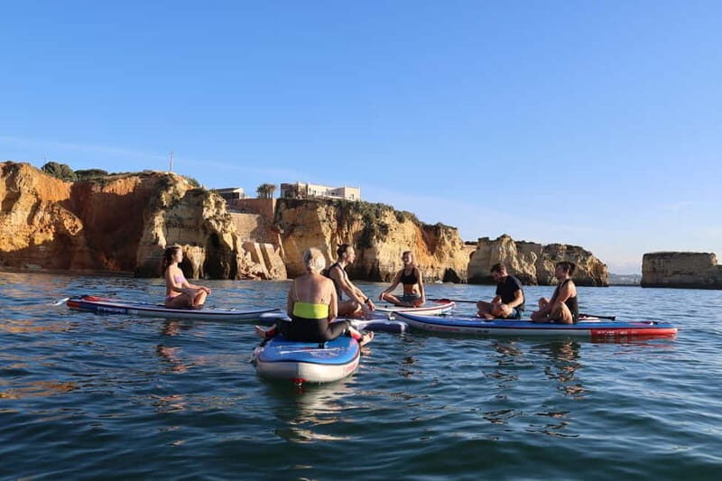 Lagos: Sunrise SUP Yoga Experience at Praia dos Estudantes - What To Expect