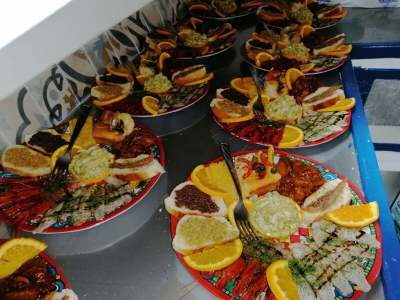 Lampedusa: Boat Cruise with Swimming Stops and Italian Lunch - Key Points