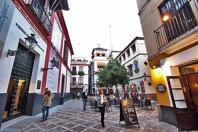 Learn Spanish Seville Santa Cruz Walking Tour - Practical Details and Considerations