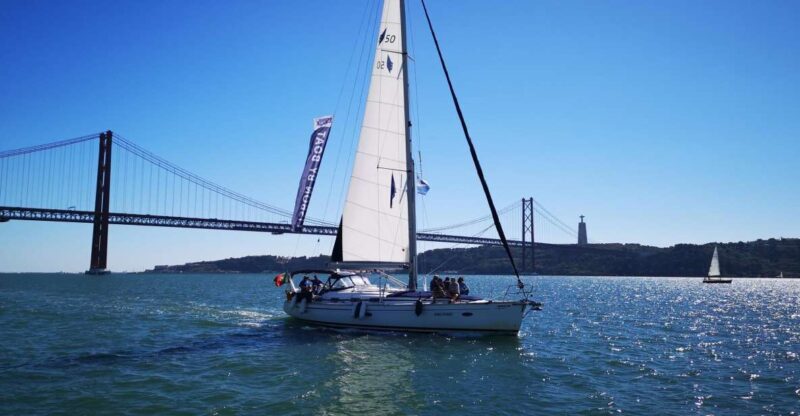Lisbon: 2-Hour Sailing Yacht Cruise & Guided Tour w/2 drinks - The Sum Up