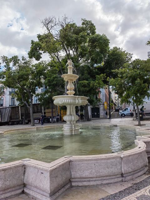 Lisbon: hop on hop off sightseeing Tuktuk tour - The Sum Up