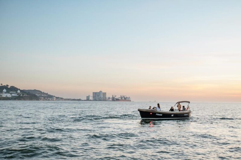Lisbon: Relax in the Waves - Open Bar and Snacks at Sunset - Timing and Group Size