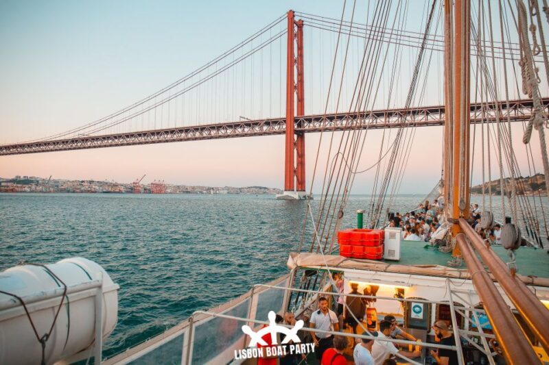 Lisbon: Sunset Boat Party with 2 Drinks and Free Club Entry - Party Atmosphere and Music