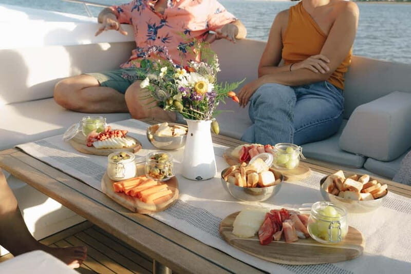 Lisbon Sunset Boat Tour with local Snacks & Drinks - Key Points