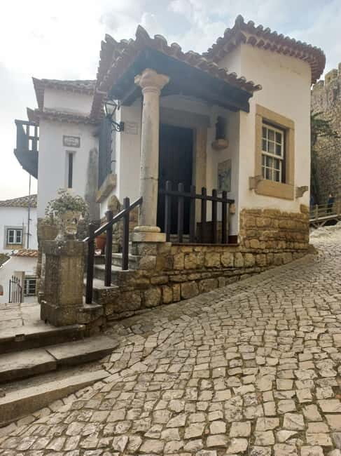 Lisbon: Transfer to Porto with Obidos and Nazare - An Authentic Route from Lisbon to Porto