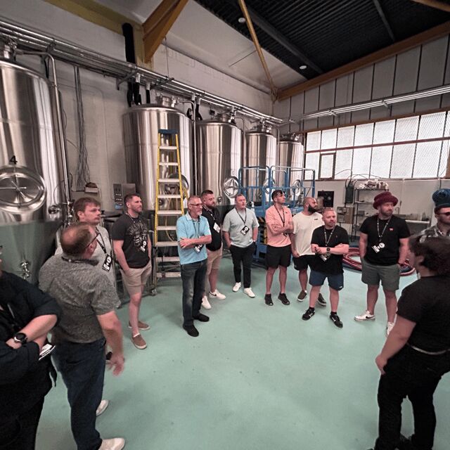 Liverpool: Brewery Bus Tour with 12 Beer and Pizza - Key Points