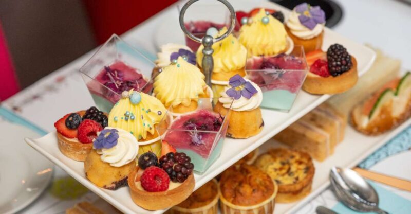 London: Gin and Afternoon Tea Bus Tour with Audio Guide - Audio Guide and Informative Commentary