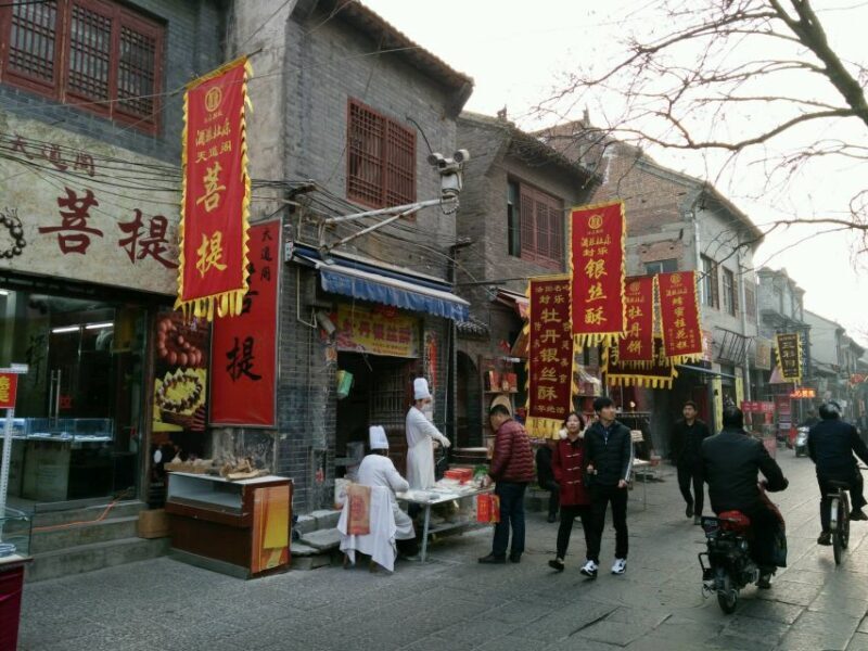Luoyang Classic Day Tour Longmen Grottoes Old Twon Explore - Strolling Through Lijingmen Street