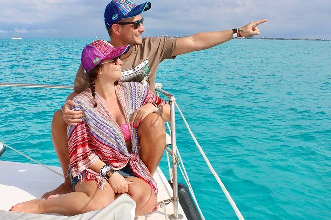 Luxury Catamaran to Isla Mujeres All Inclusive Open Bar Buffet - Return and Sunset Celebrations