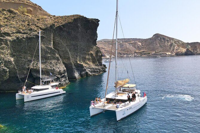 Luxury Santorini Sunset Cruise: Dinner, BBQ, Open Bar, Transfers - Rejuvenating at the Hot Springs