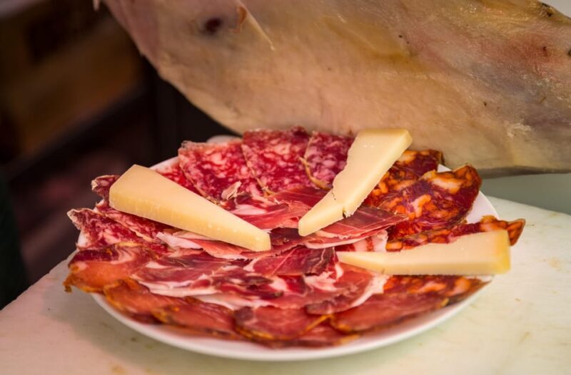 Madrid: Authentic Tapas Evening Tour with a side of History - Guides and Group Size