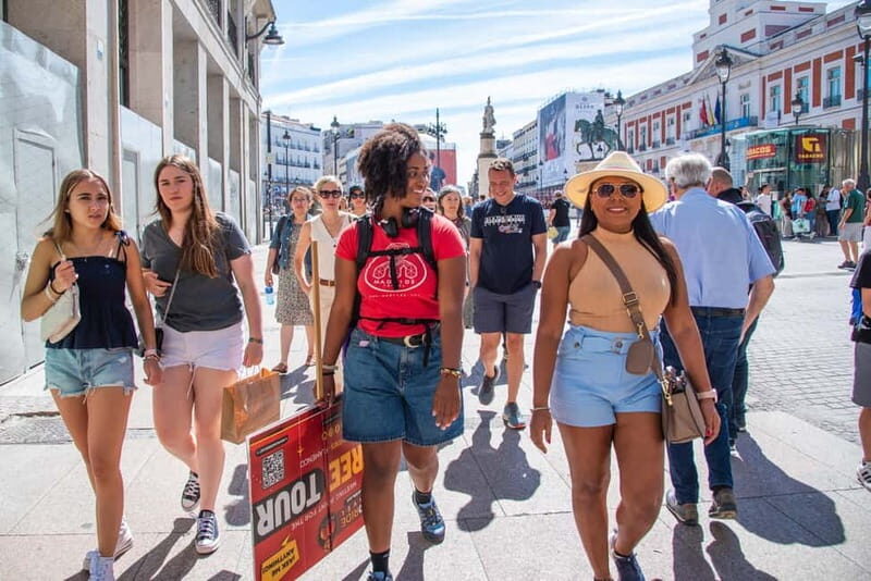 Madrid Essential Walking Tour with Churros, Drink & Market - Key Points