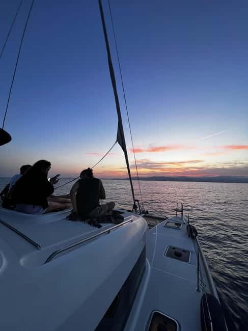 Majorca: Dinner aboard a private catamaran with snorkeling and paddle surfing - Practical Considerations and Value