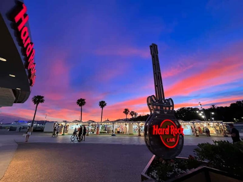 Malaga: Hard Rock Cafe Entrance with Lunch or Dinner - Music and Atmosphere: The Heartbeat of Hard Rock