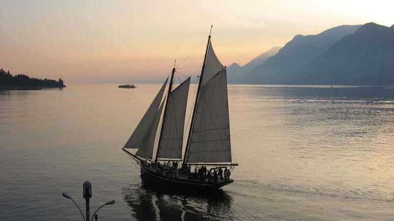 Malcesine: Golden Sunset Cruise with Food, Drinks & Music - What Makes It Stand Out
