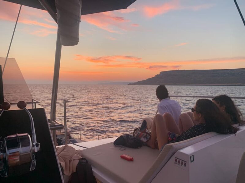 Malta: Blue Lagoon Evening Catamaran Cruise - Onboard Experience: Food, Drinks, and Atmosphere