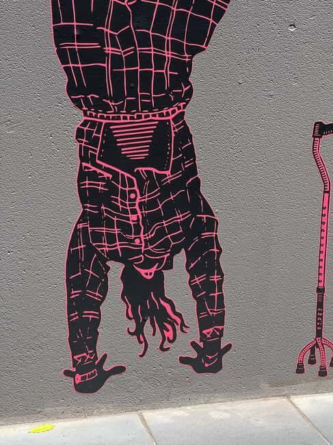 Melbourne: Art in the Streets Walking Tour with Drink - Architecture and Artistic Integration
