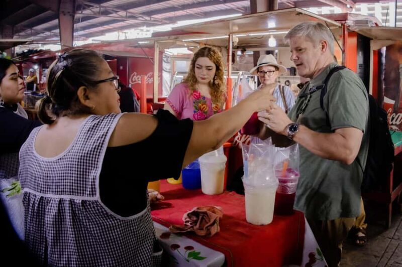 Merida: A food tour of typical Yucatecan cuisine. - The Market Experience: Bustling, Colorful, Authentic
