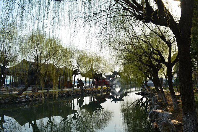 Mini Group: One-Day Zhouzhuang and Jinxi Water Town Tour - Guide and Overall Experience