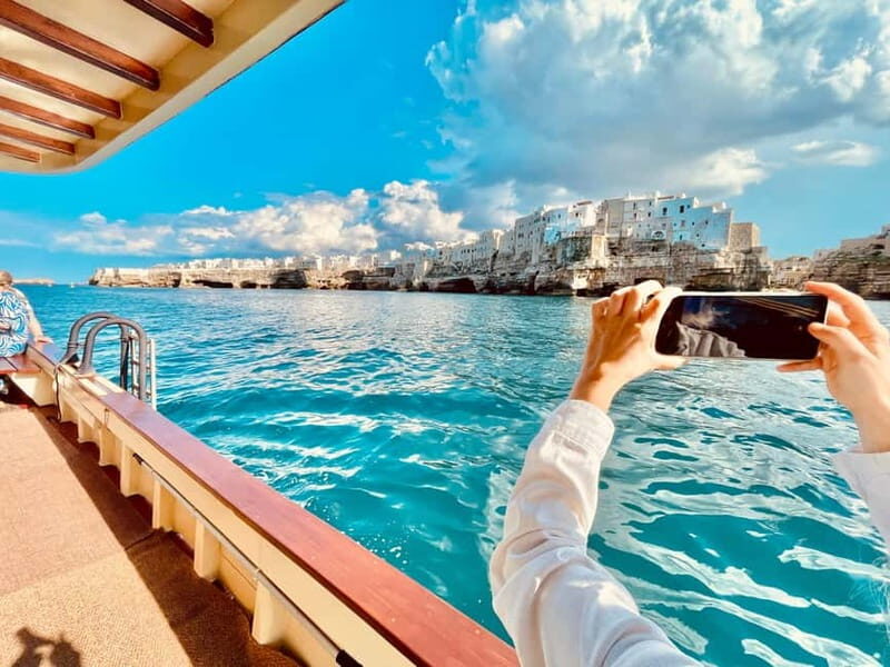 Monopoli-Polignano: sunset boat tour on a traditional wooden boat - Key Points