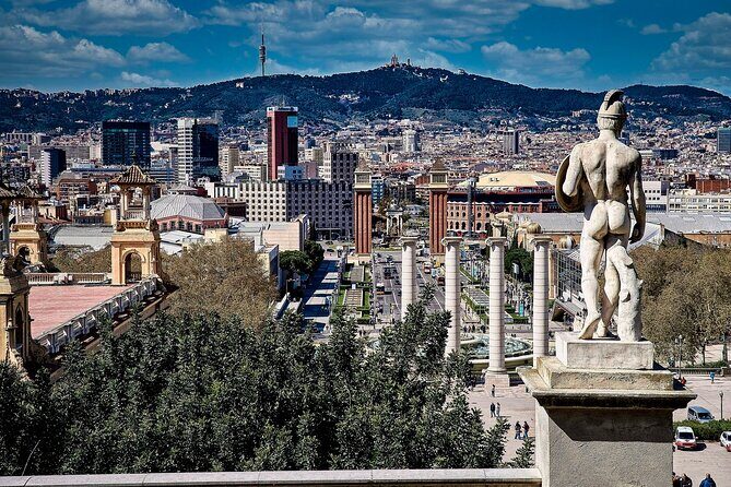 Montjuic Electric Bike Tour and Relaxing Sailing Trip - Savoring the Moment with Cava