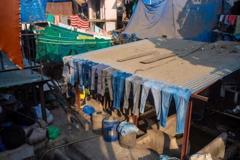Mumbai: Dharavi Slum and Dhobi Ghat Laundry Tour - Visiting Dhobi Ghat: The Worlds Largest Open-Air Laundry