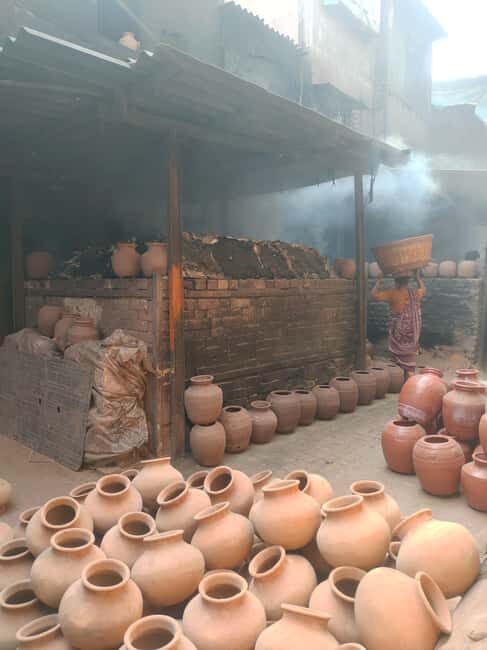 "Mumbai Dharavi Slum Tour" - Crossing into the Residential Realm: Markets, Schools & Pottery