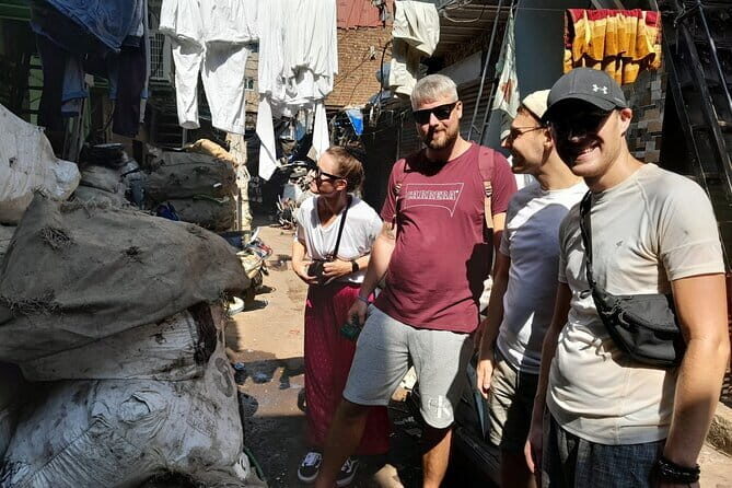 Mumbai Slum Dhobi Ghat and Train Ride Tour with a Local Guide - Authentic Voices and Real Insights