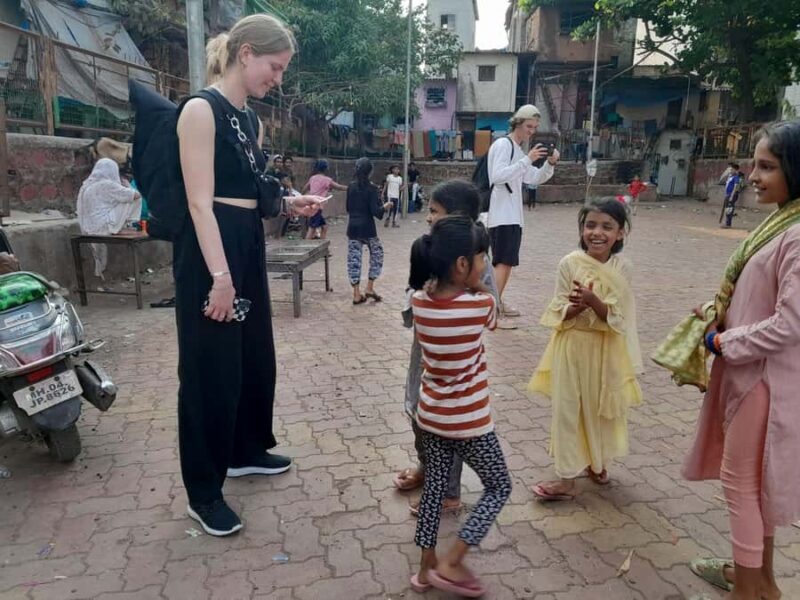 Mumbai Slum Tour with Dhobi Ghat Laundry & Flower Markets - Key Points