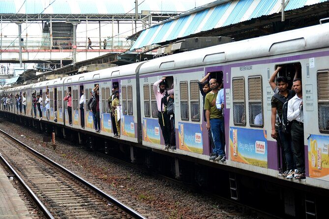 Mumbai Slum Tour with Dhobi Ghat Laundry & Train Ride Tour - Key Points