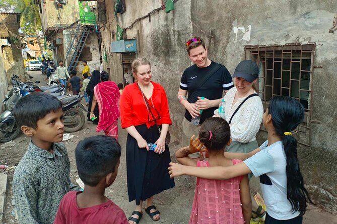 Mumbai Slum Tour with Dhobi Ghat Laundry & Train Ride Tour - Practical Tips for Booking & Participating