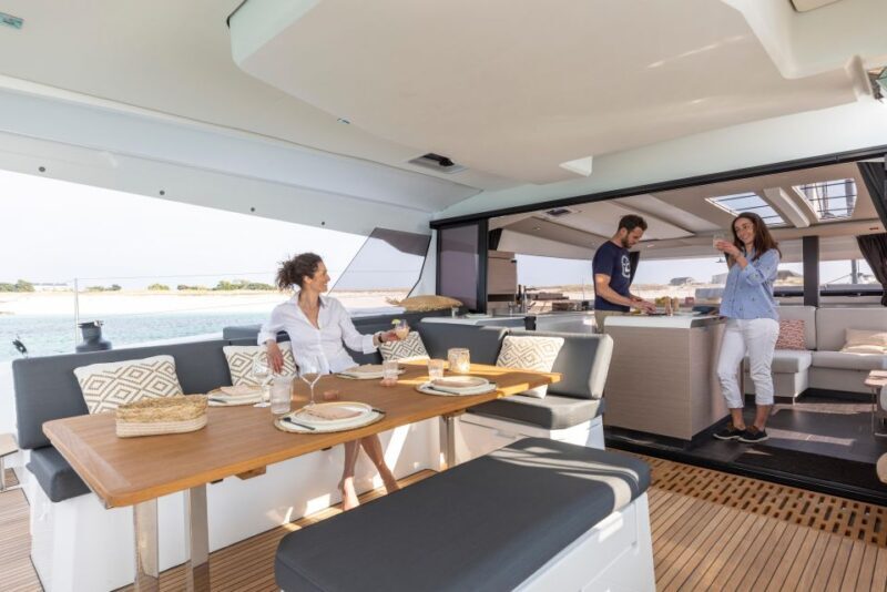 Mykonos: Catamaran Cruise with 3-Course Meal and Transfers - Key Points