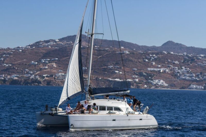 Mykonos: Catamaran Cruise With Meal and Drinks - Pickup and Departure