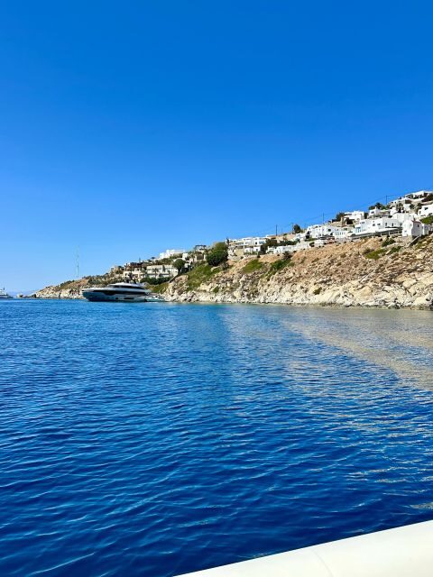 Mykonos: private half-day cruise south beaches of Mykonos - The Experience of a Private Antique Boat Cruise in Mykonos