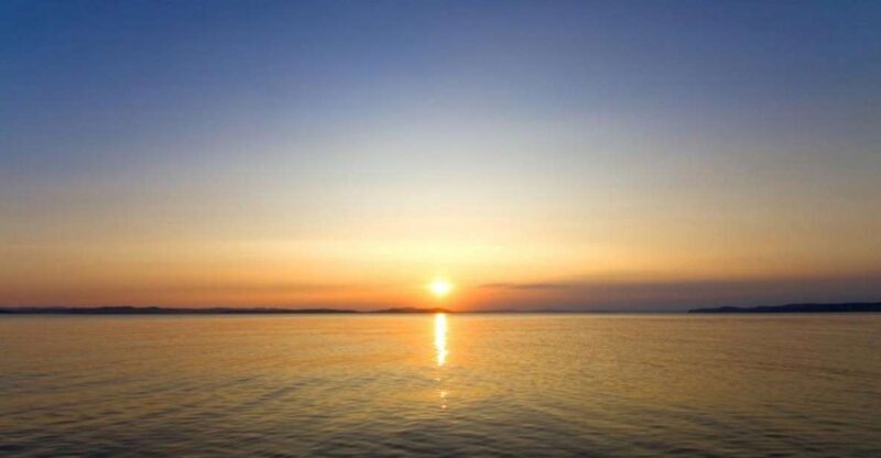 Mykonos: Semi-Prive Aegean Sunset Cruise with Mykonian Snack - Setting Sail on a Mykonos Sunset Adventure