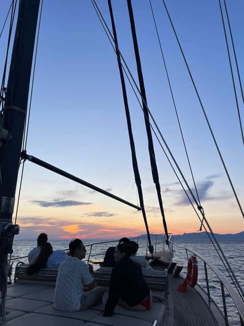 Mykonos: Sunset Boat Cruise with Light Dinner & Drinks - An Authentic Mykonos Sunset Experience
