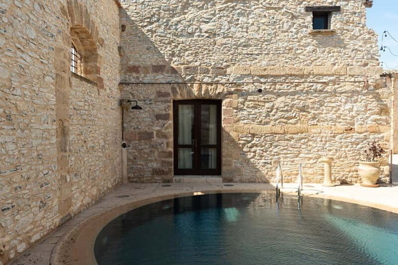 Nature and relaxation by the pool at Baglio Passofondo Estates - A Deep Dive into the Experience