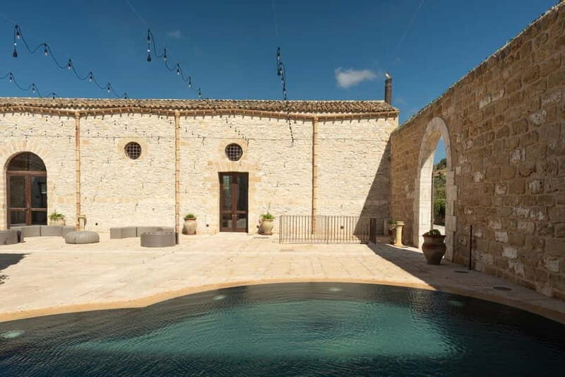 Nature and relaxation by the pool at Baglio Passofondo Estates - FAQ