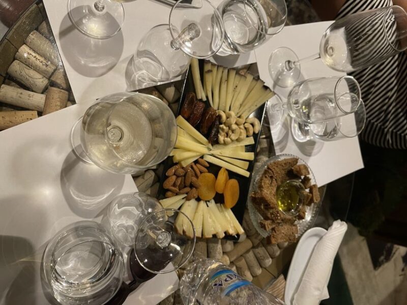 Naxos Town: Walking Food Tour with Wine Tasting - Cheese and Herbs at a Historic Grocery Store
