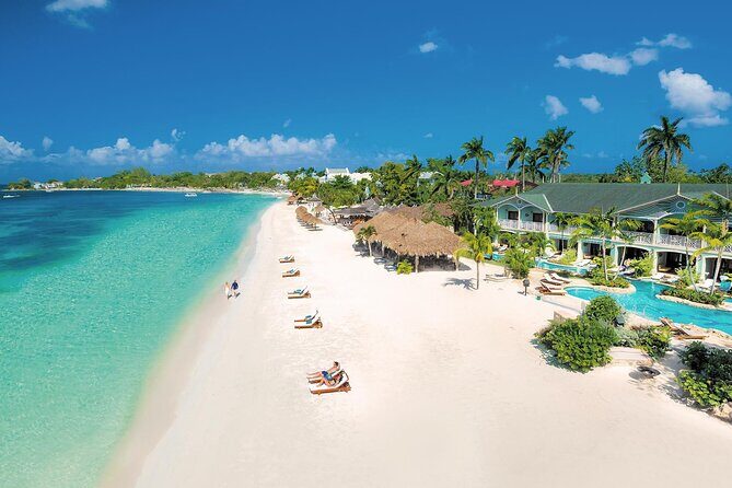 Negril 7 Mile Beach Ricks Café and Shopping Tour from Montego Bay - Transport and Logistics