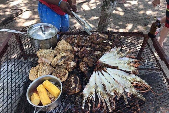 Negril Ricks cruise PLUS Booby Cay Lobster & Cave Snorkeling - Exploring Pirate Caves and the Negril Cliffs