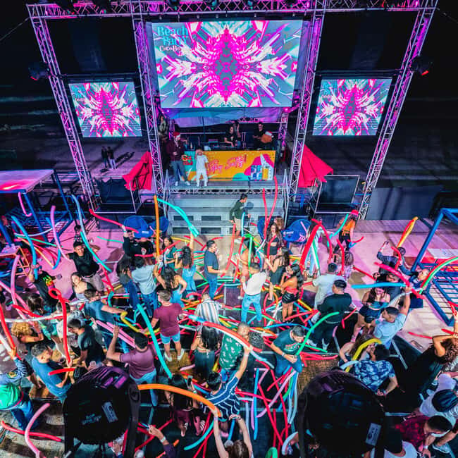 Neon Glow night Beach Party Premium - Authenticity and the Experience’s Value