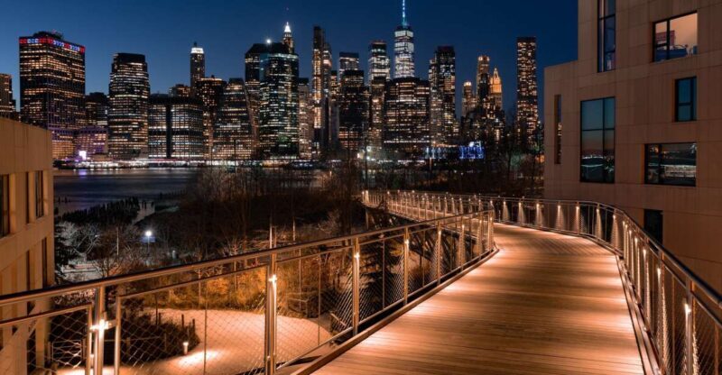 New York City: Night Skyline Bus Tour with Pizza Slice - Key Points