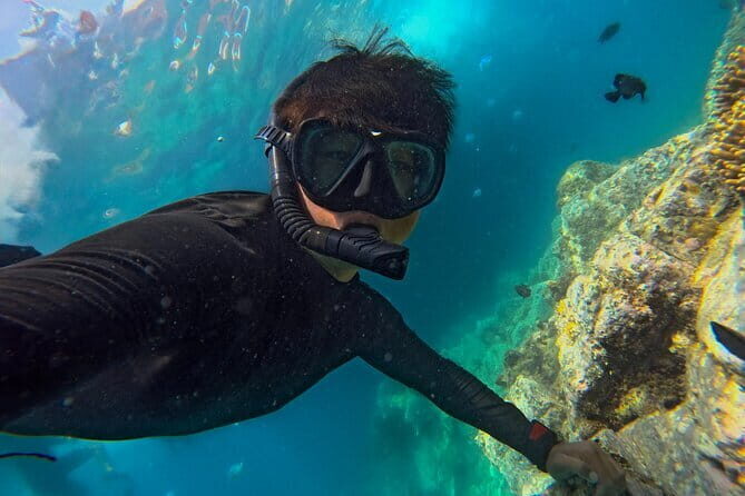 Nha Trang Coral Adventure Snorkeling and Floating Bar Experience - Third Stop: Nha Trang Beach – Floating Bar, Water Slide, and Sunset Views